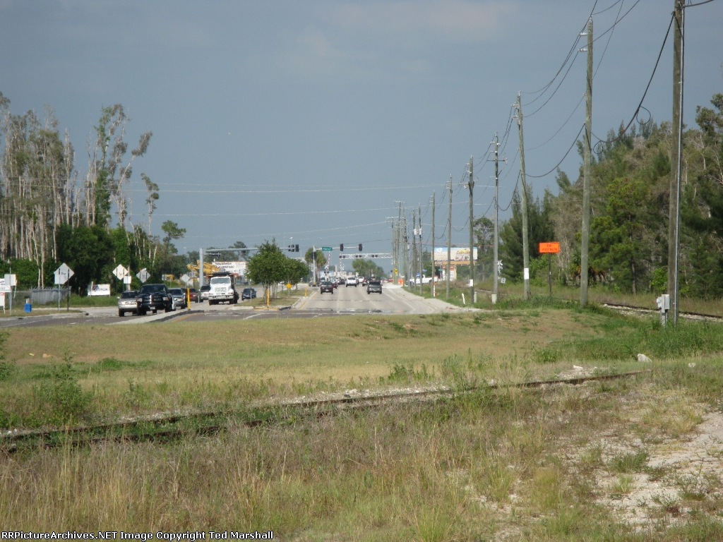 Looking east down Alico Road from where it used to cross the tracks, AX ...