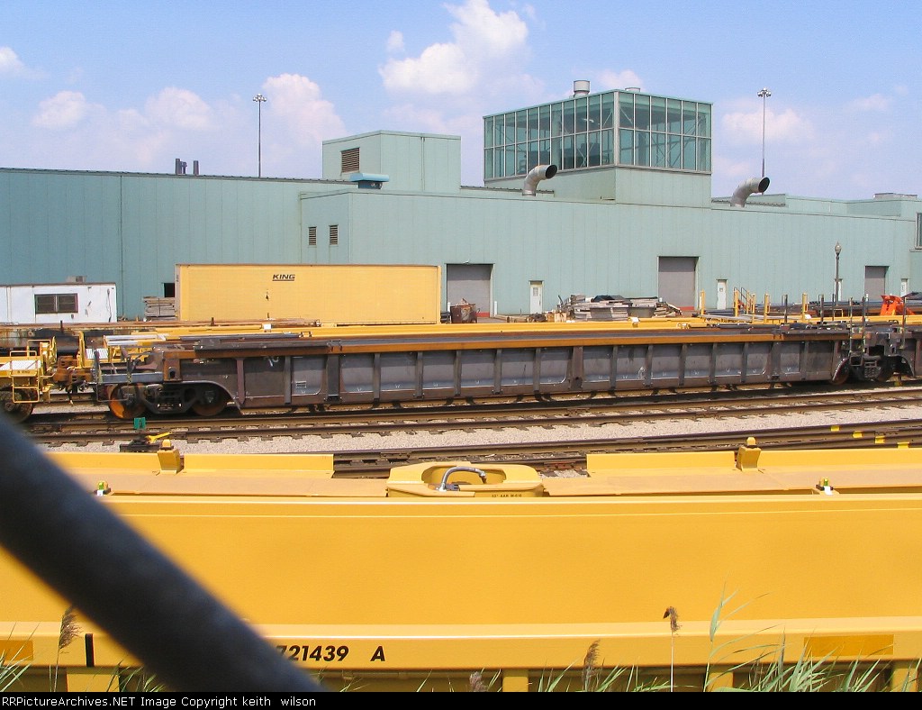 NEW UN-PAINTED DOUBLE STACK CAR AT NATIONAL STEEL CAR