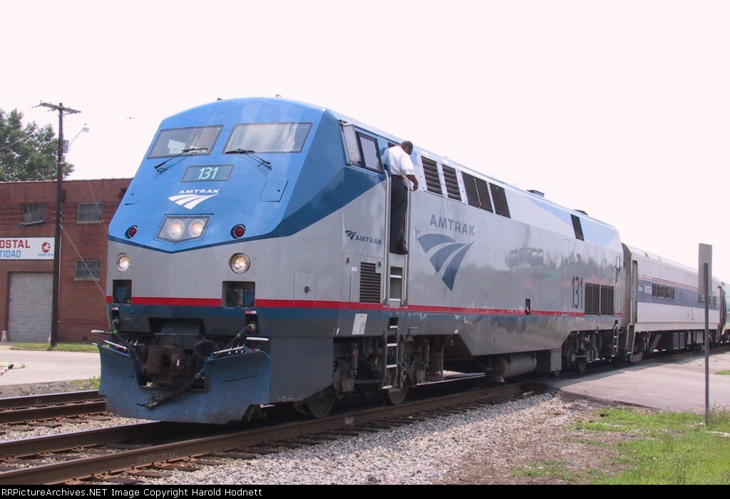 AMTK 131 brings a northbound train to the station