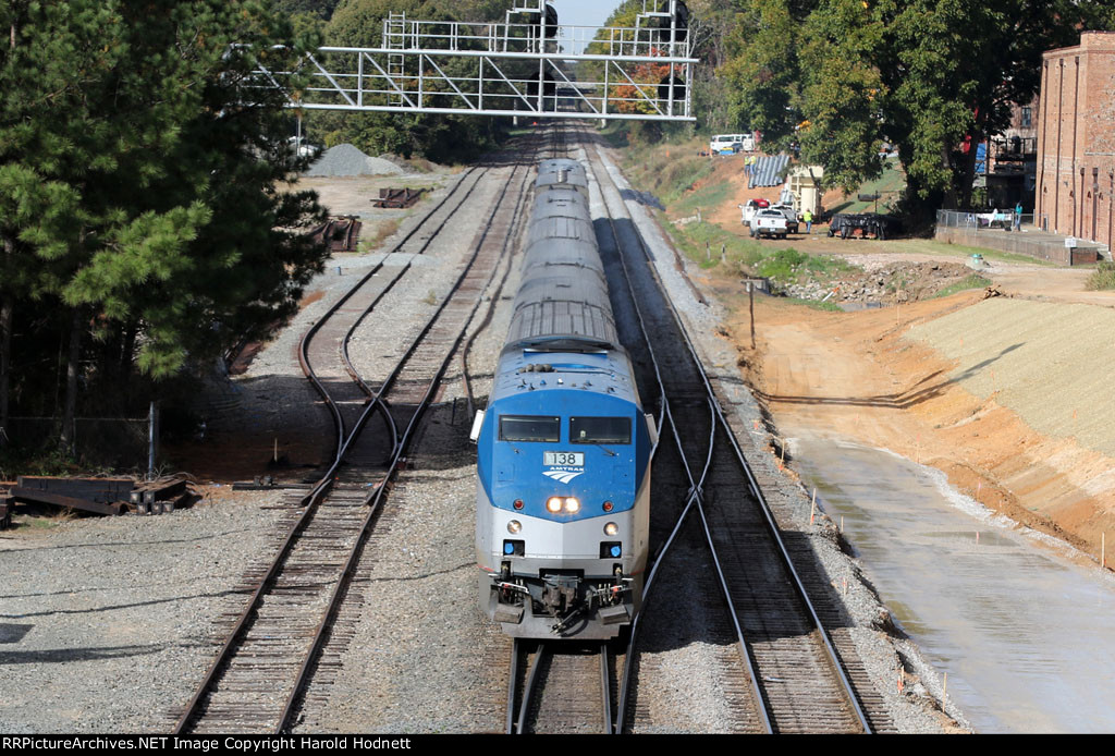 AMTK 138 leads train 80 at Boylan Junction