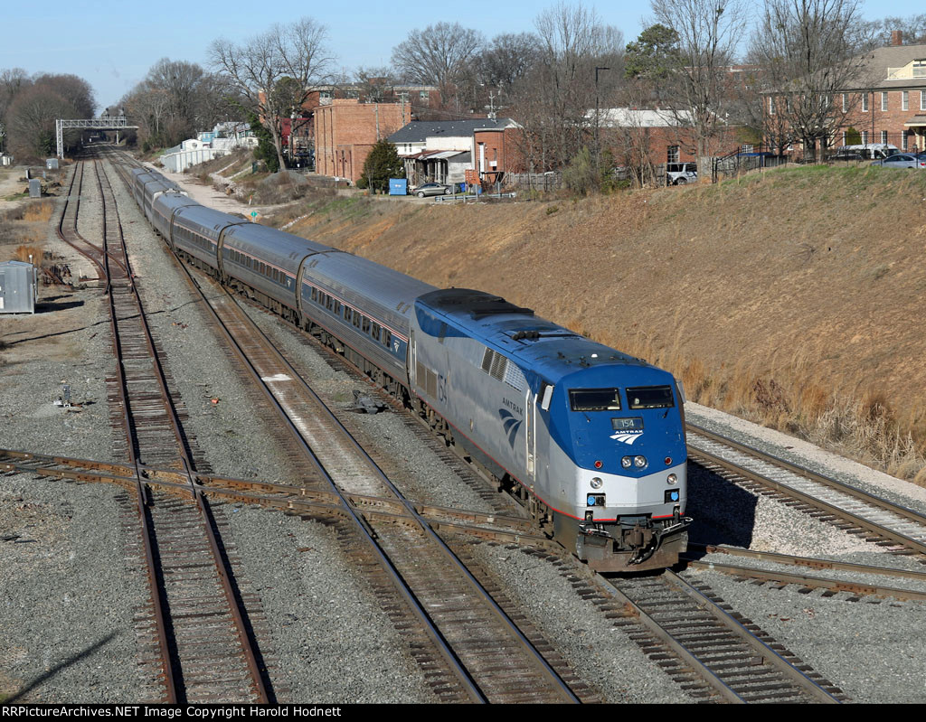 AMTK 154 leads train P092-21 across Boylan Junction