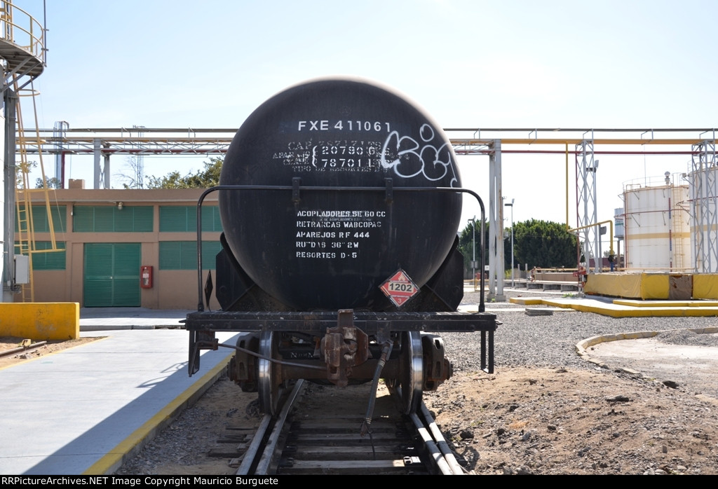 FXE Tank Car wit graffiti at yard