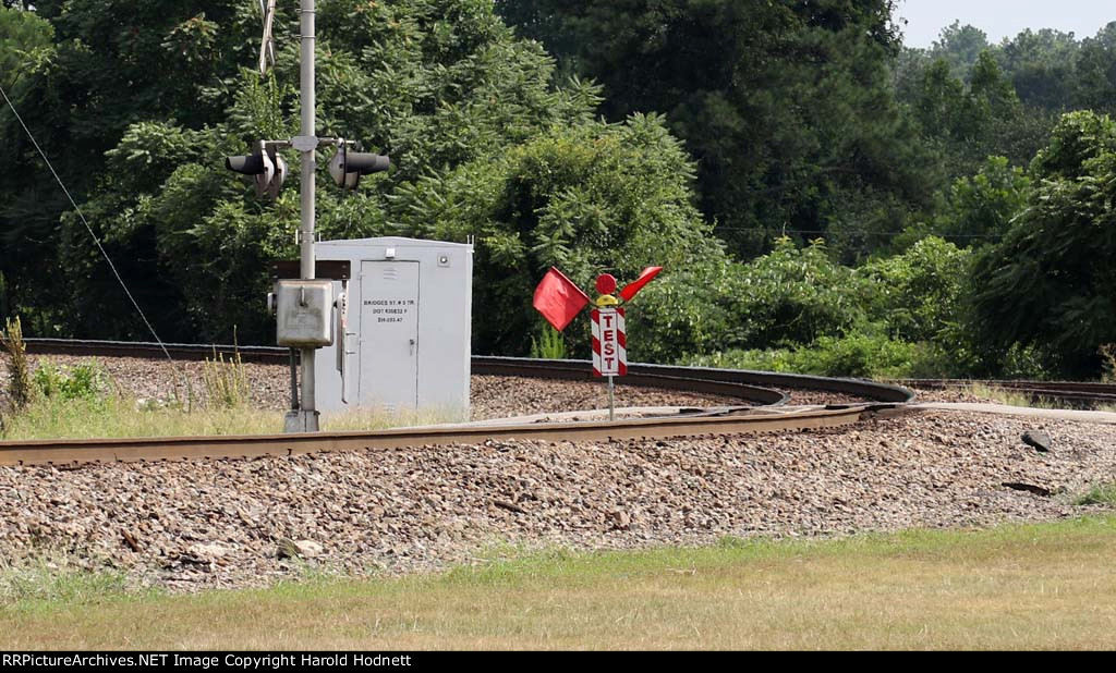 Portable track obstruction, complete with blinking red light