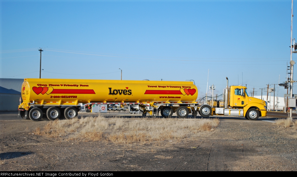 Tanker truck about to cross UP main line