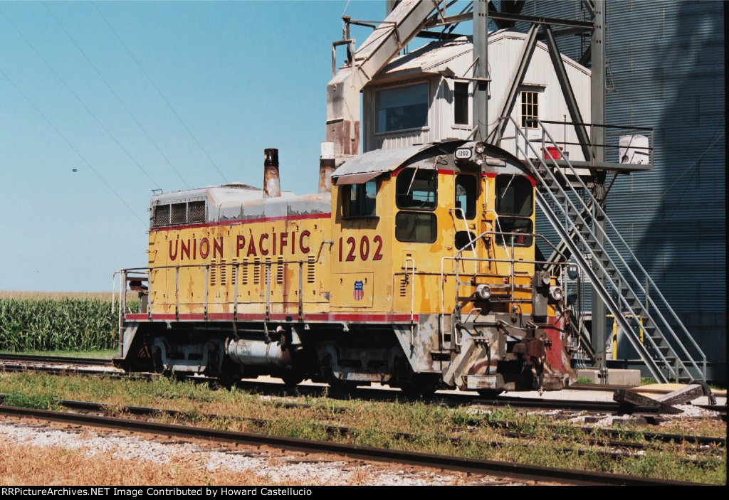 ex UP SW9 at a non descript elevator somewhere in Ill.