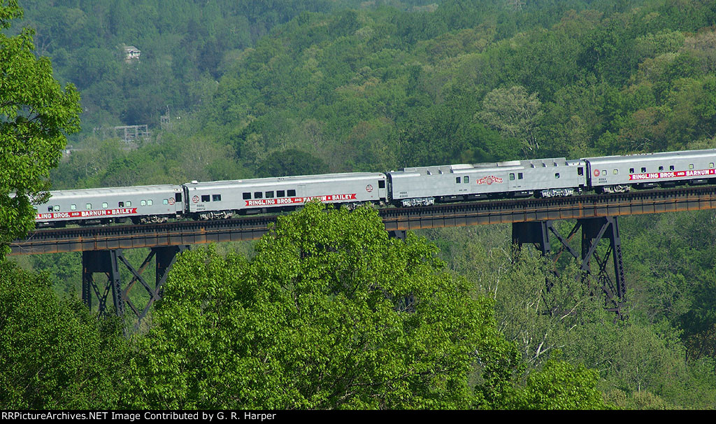 More Red Unit rolling stock up close crossing the James River