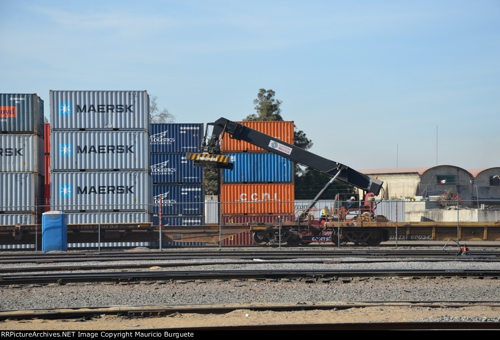 Intermodal Mexico crane loading well cars