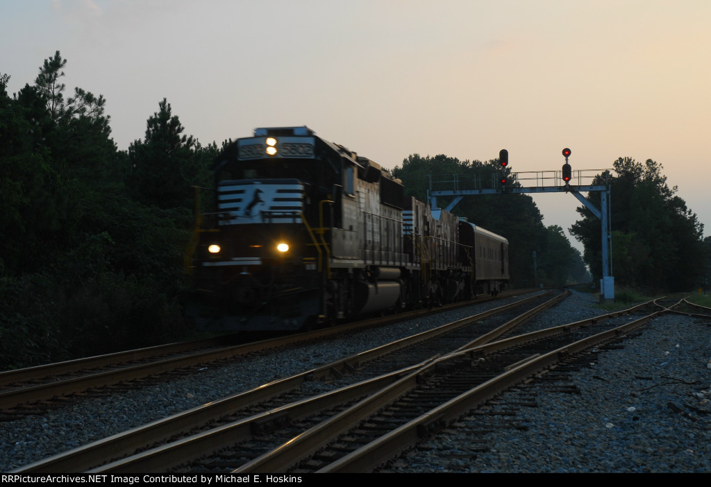 NS 5802 pulling a NS rail inspection car