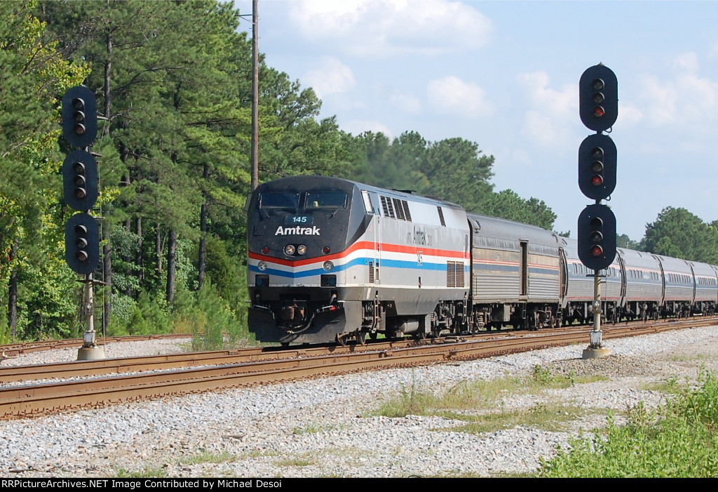 Amtrak Heritage P-42DC #145 splits the signals at Collier Yard with a ...