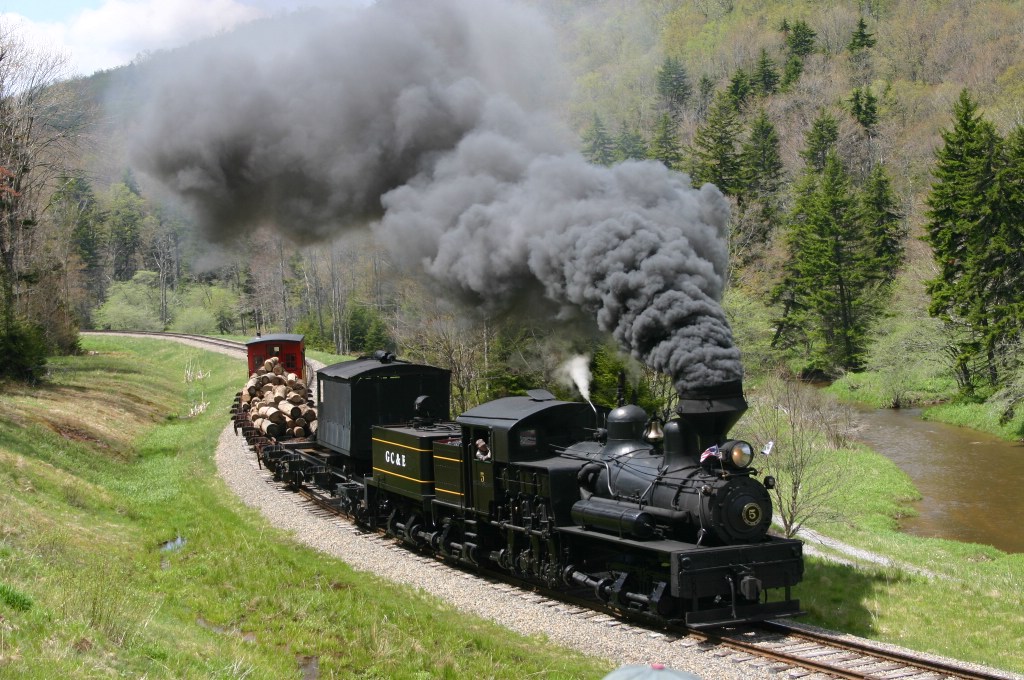 Shay 5 with log loader and log train on Spruce conector