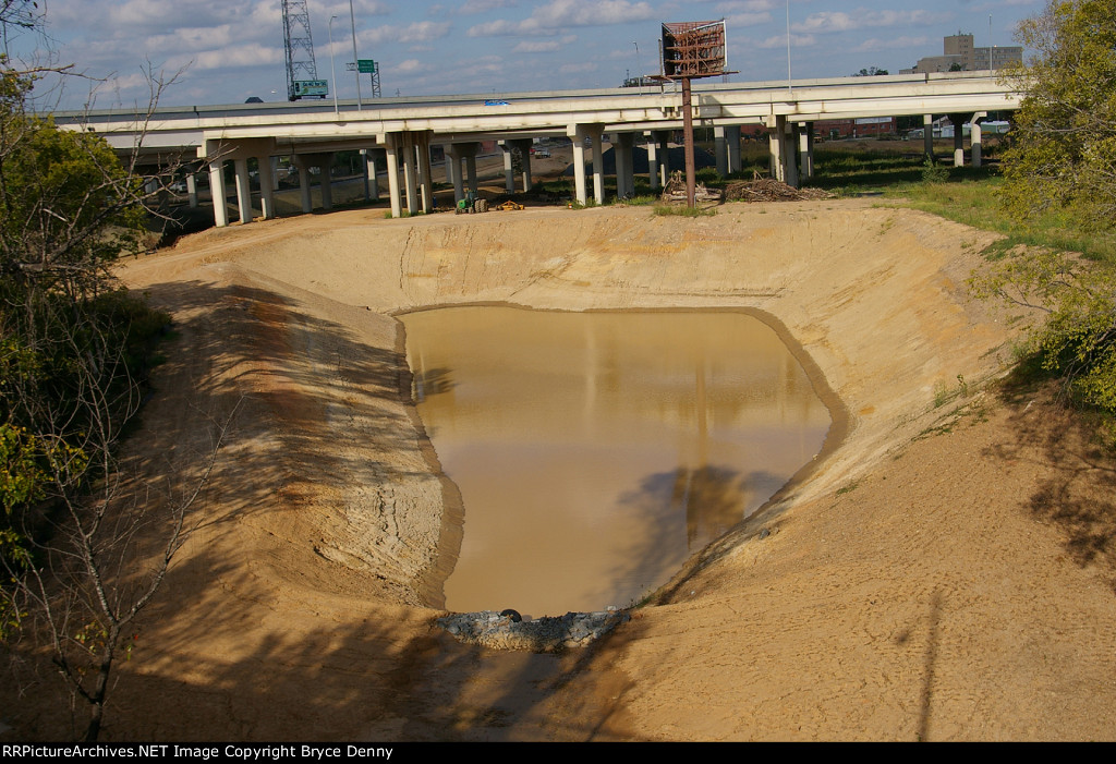 Large retention pond used in KCS grade construction.