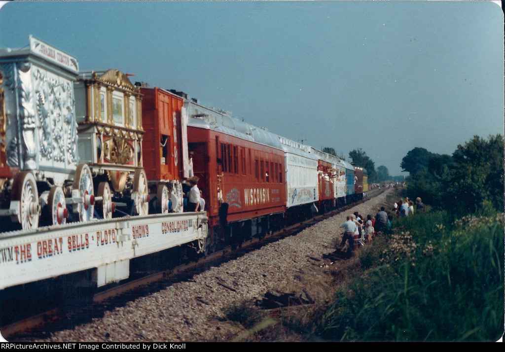 Circus train flats with wagons and passenger cars