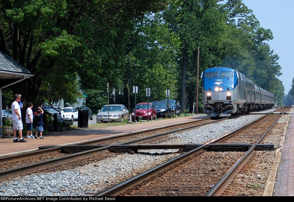 TRAIN TIME !!! Amtk P-42DC #169 brings a southbound into the station