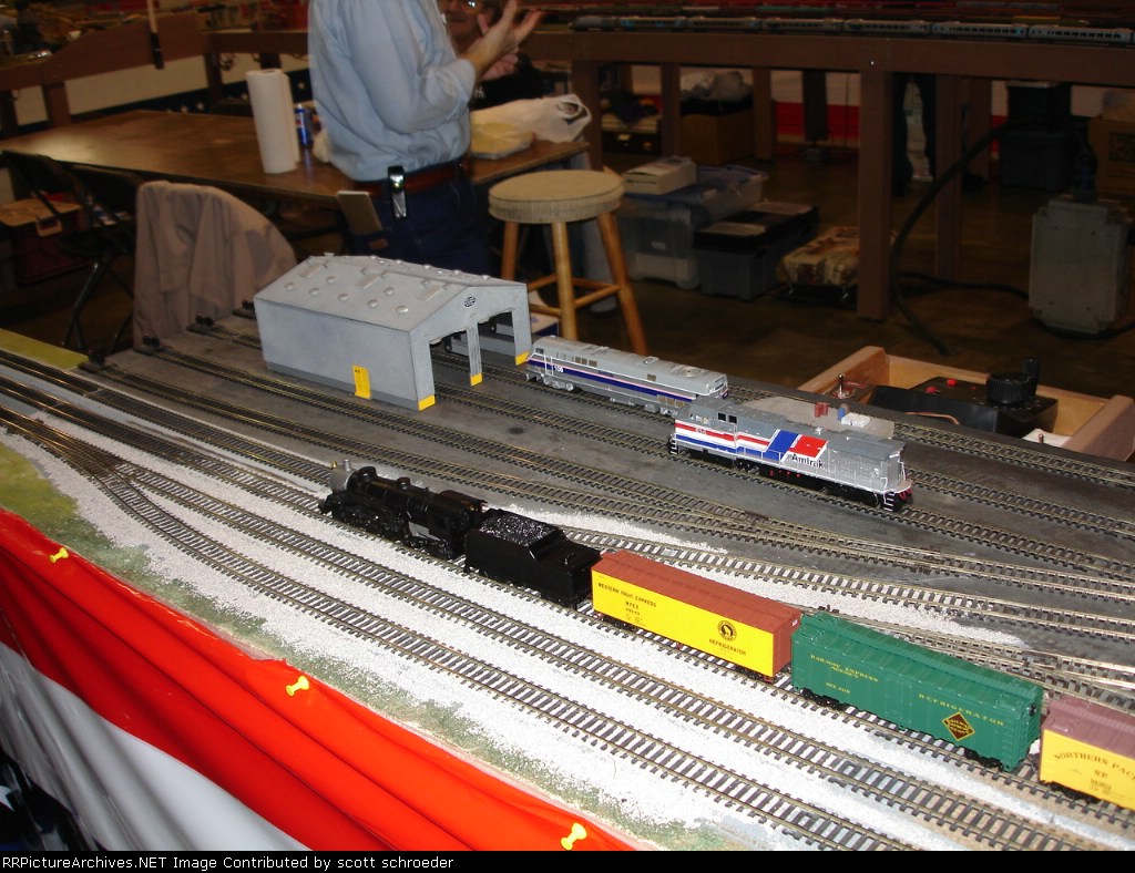 Amtrak P42DC & P32-8BWH at the house with a Steam Locomotive on the main