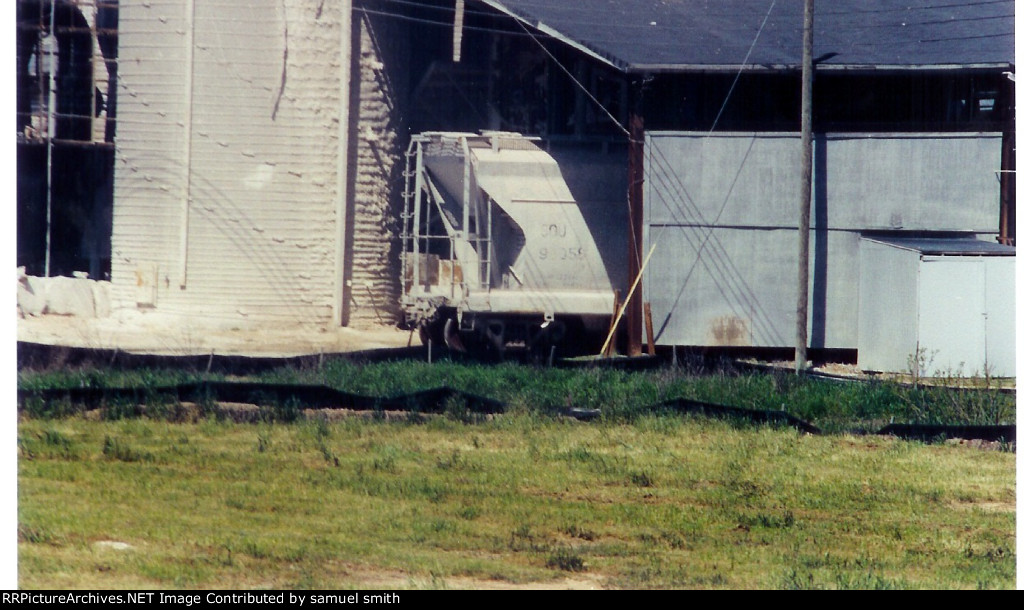 Covered Hopper under Unloading Shed at Farmers Favorite Fertilizer