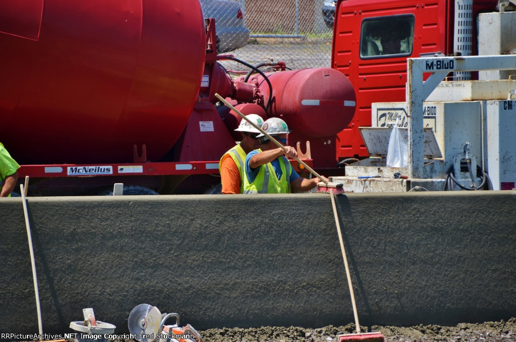 Rough it up just a bit, so that you'll scrape your knee going over it ...