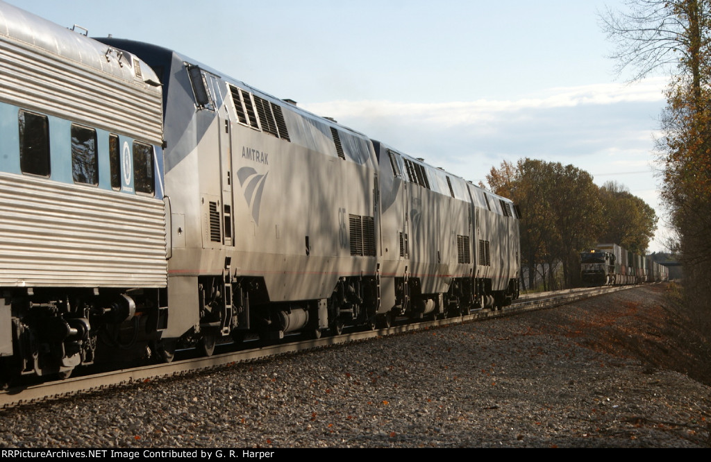 Excursion train southbound meets NS train 217 northbound just south of ...