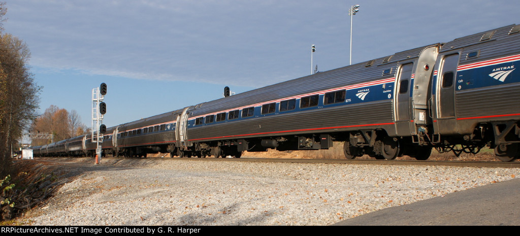 Amtrak rolling stock passing the signals at Falwell.