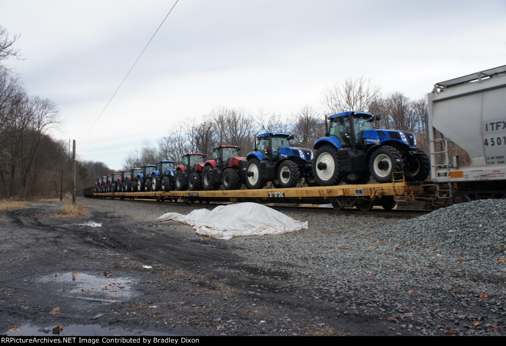 Case red and blue tractors
