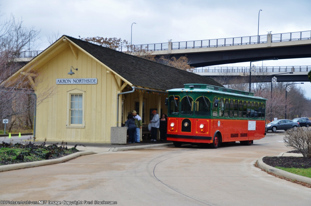 Trolley buses shuttle folks back to the depot.