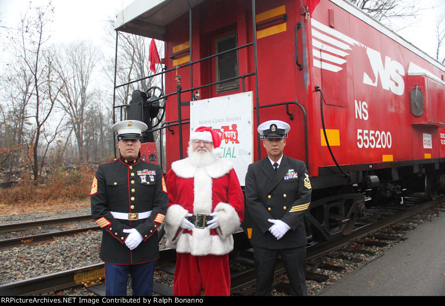 Santa and the service Reps(USMC, left, US Navy,right) pose at the first ...