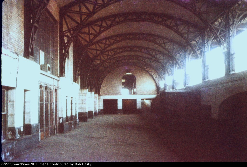 The concourse in the rear is open. Station entrance on the left. You ...