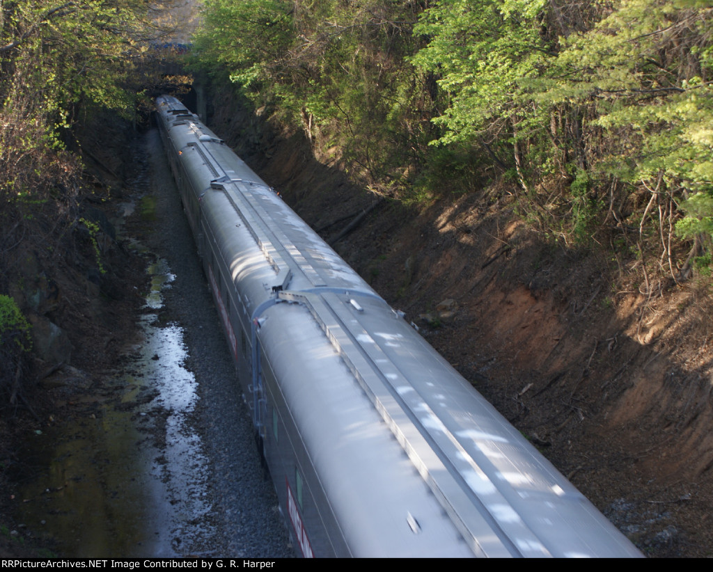 Passenger cars on the Ringling Blue Unit, NS 047, exit the Rivermont Tunnel