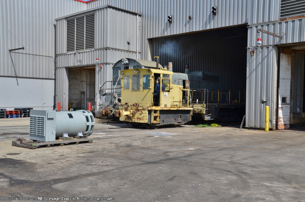 The GE 25 Tonner pulls 2 works in progress out into daylight.