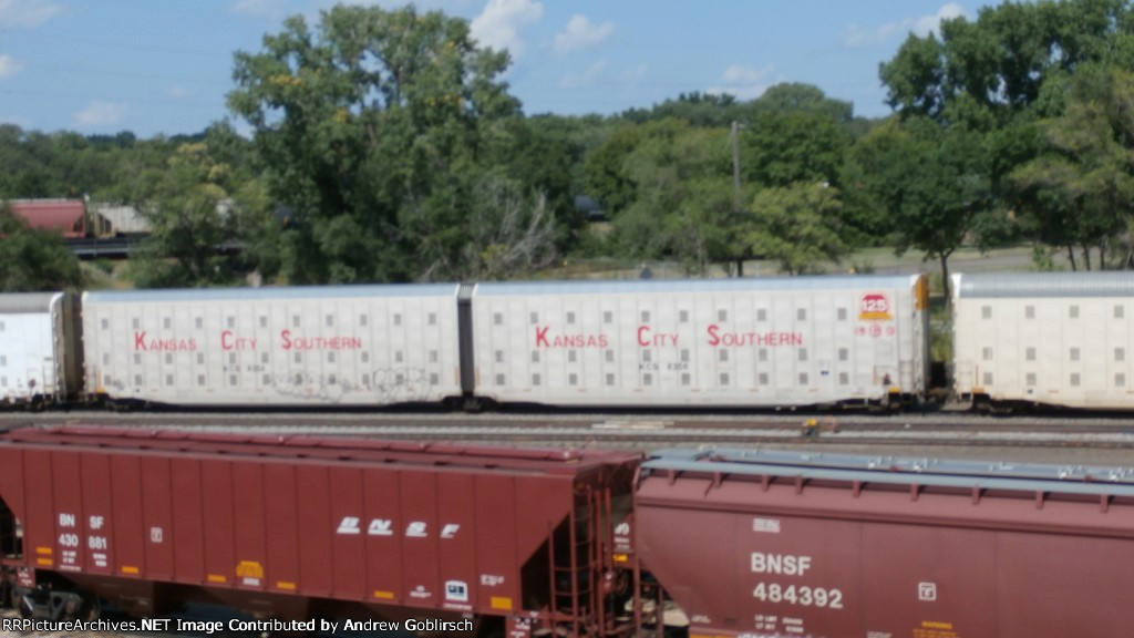 BNSF 484392 430881 & a KCS Autorack