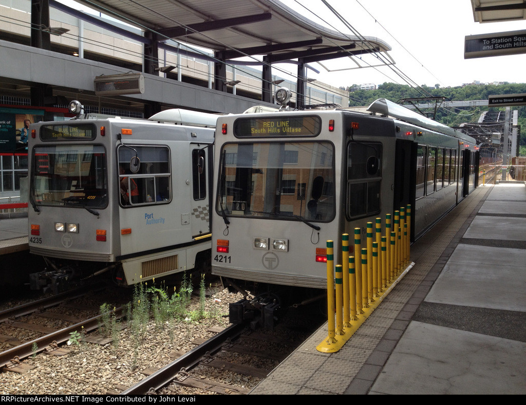 Two T Light Rail Trains at 1st Ave Station