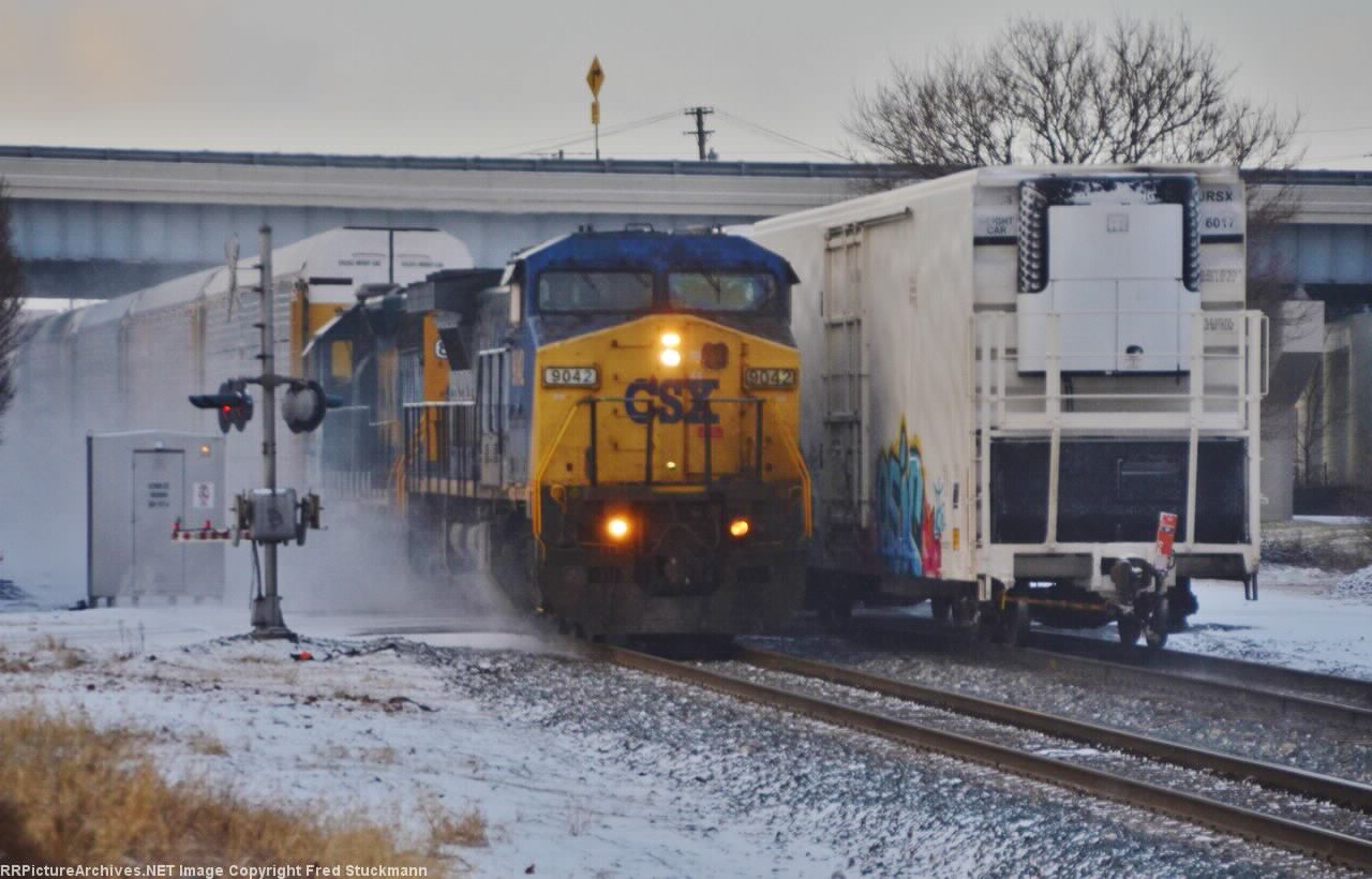 CSX 9042 meets the westbound at Voris St.