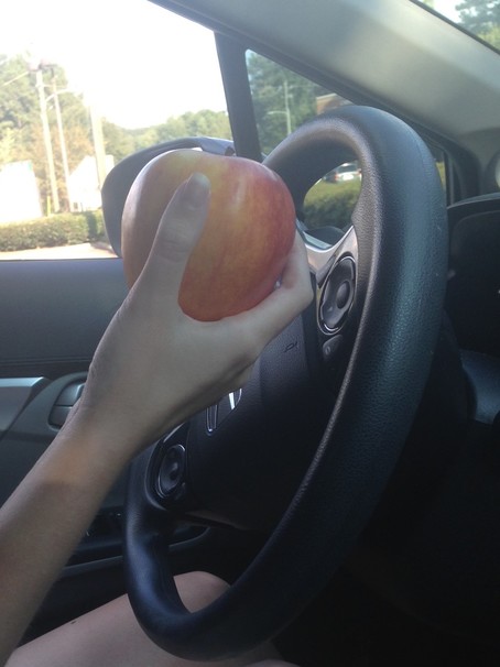 Studies Show Eating While Driving is Almost as Bad as Texting
