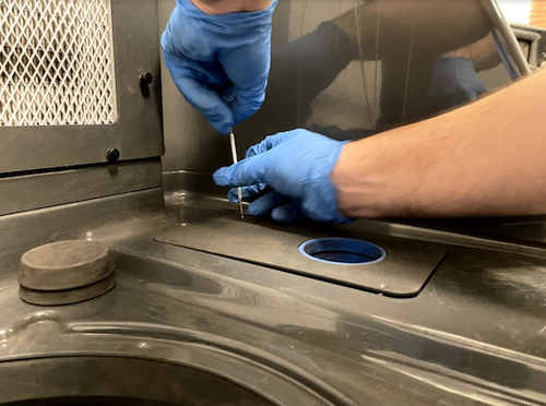 Adding fresh powder to the Fuse Sift