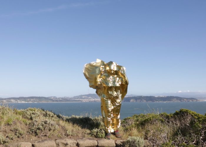 The art of leaning against the wind inside an emergency blanket | Datebook