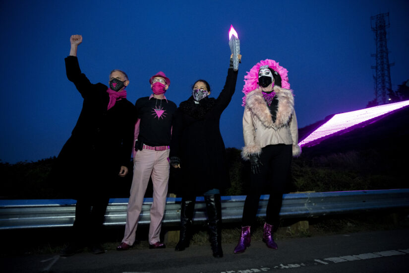 LED-powered pink triangle shines in dark times on its 25th anniversary ...