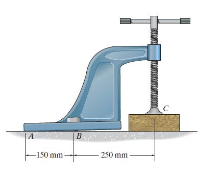 [Solved] The hold-down clamp exerts a compressive | SolutionInn