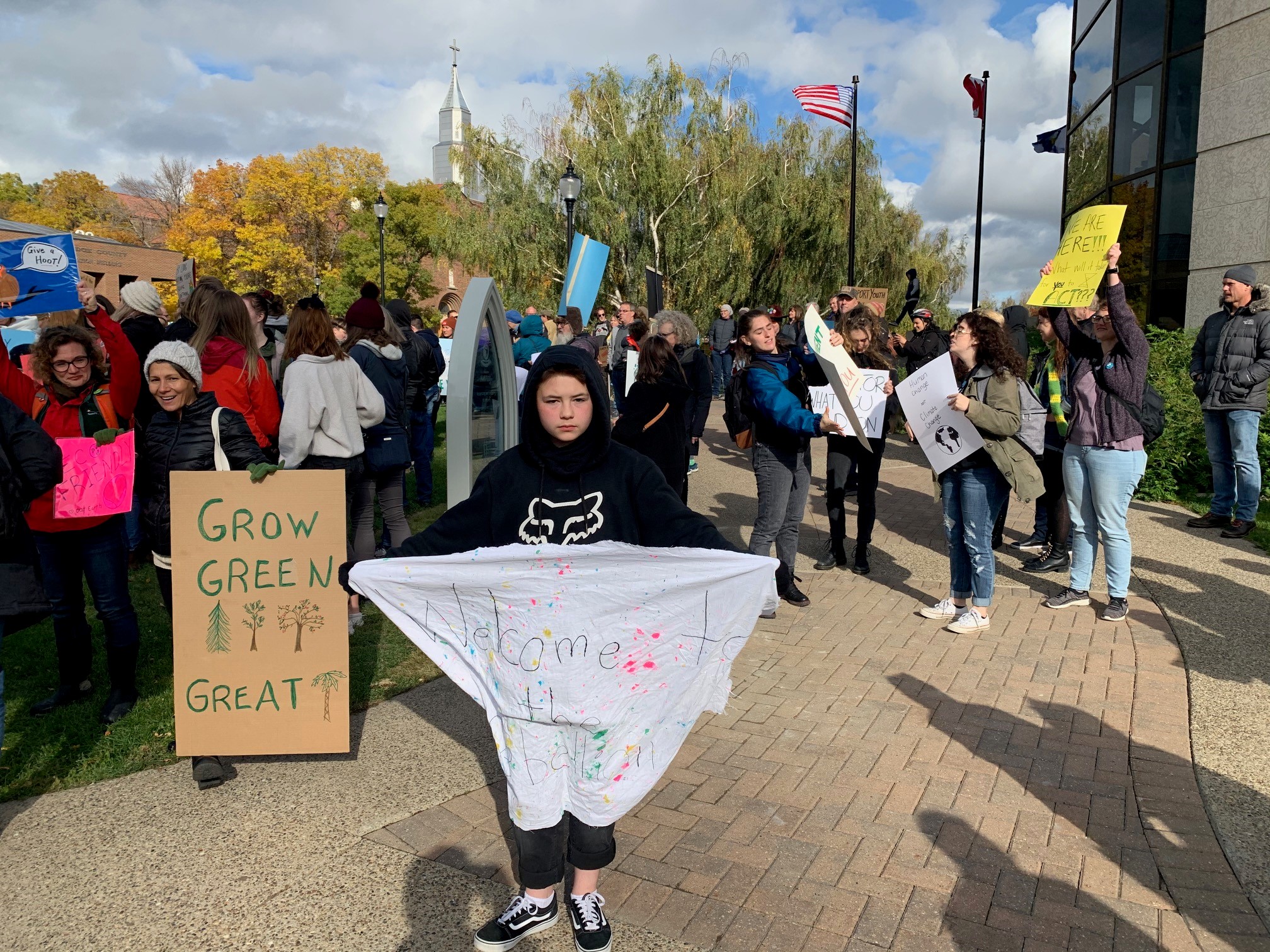 Hundreds protest for climate change action at Lethbridge City Hall ...