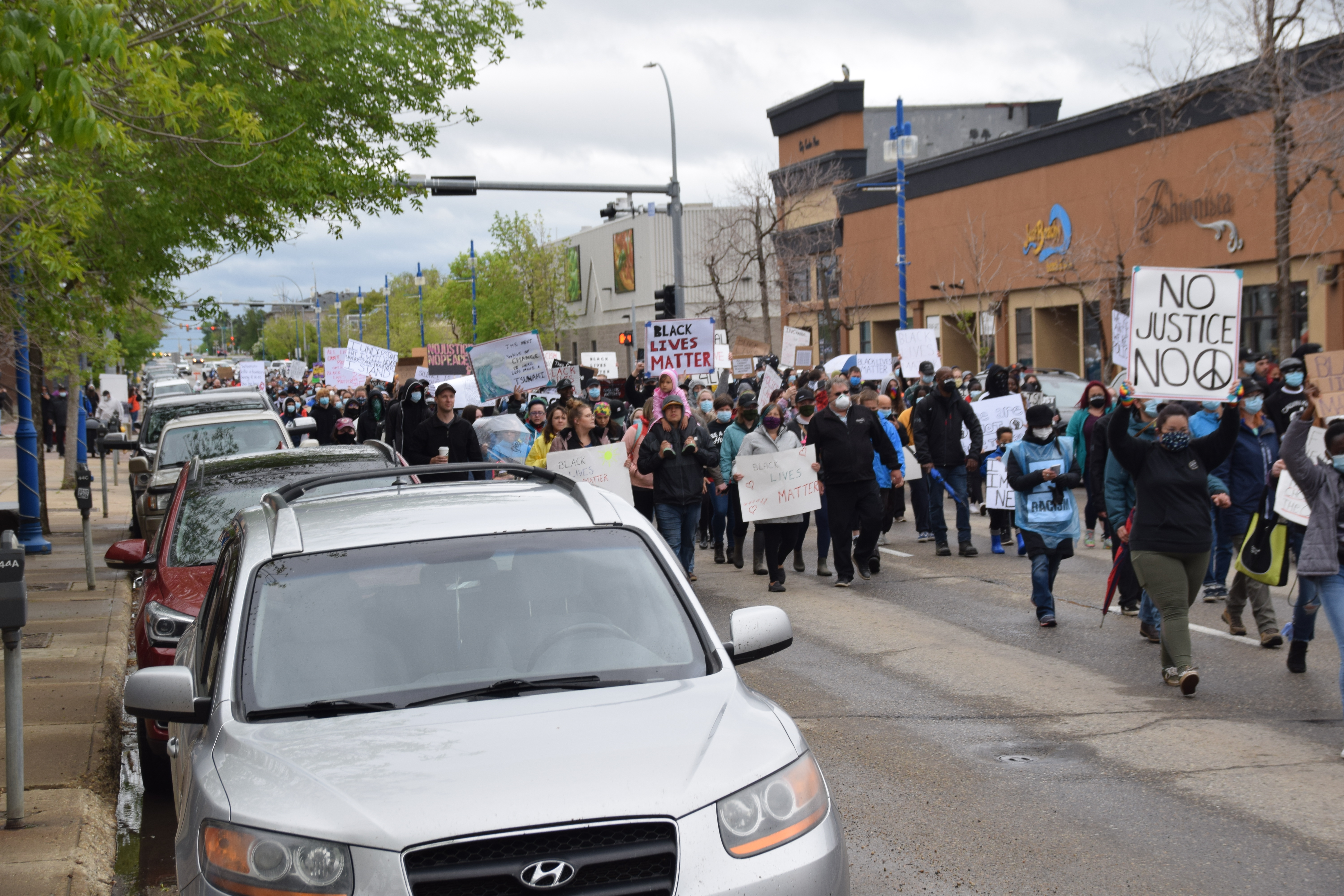 Black Lives Matter protest draws in massive crowd of supporters ...