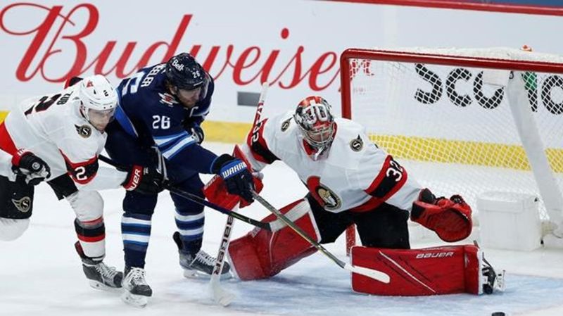 Rookie Tim Stutzle scores first NHL hat trick, Senators defeat Jets 4-2 ...