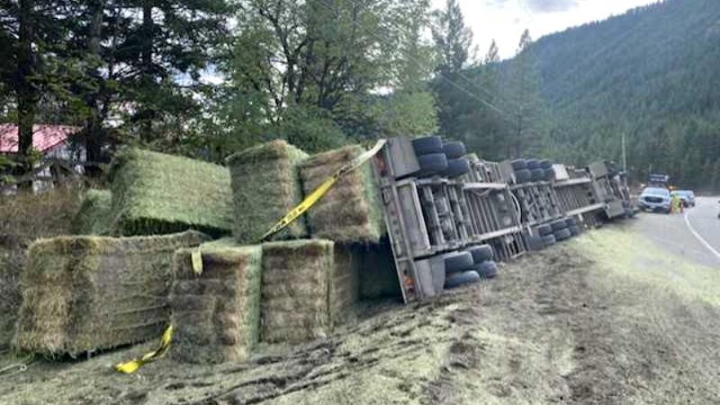 Semi hauling hay overturns on highway | Vernon Matters