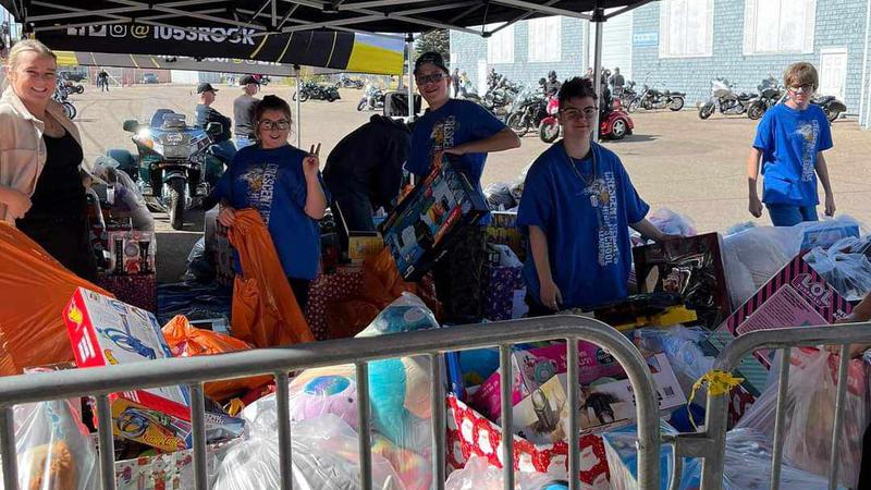 More than 20,000 toys, $21,000 donated at Santa Claus Fund Toy Run ...