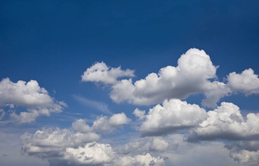 Low angle view of clouds in blue sky - StockFreedom - Premium Stock ...
