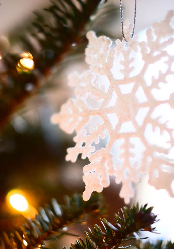 Close-up of snowflake ornament on Christmas tree - StockFreedom ...