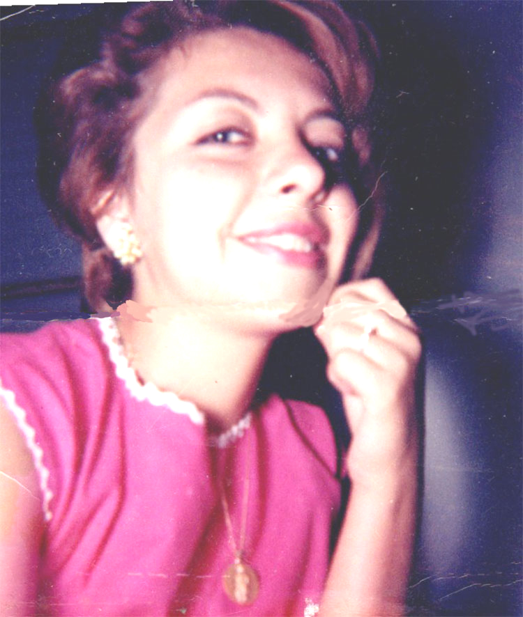 This online memorial is dedicated to Carmen "Mela" E. May. It is a ...