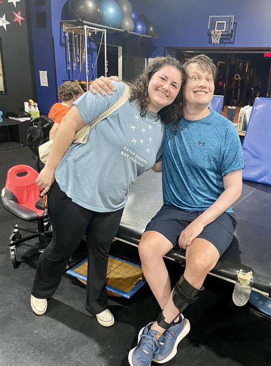 Karina at CORE helping Evan learn to walk again