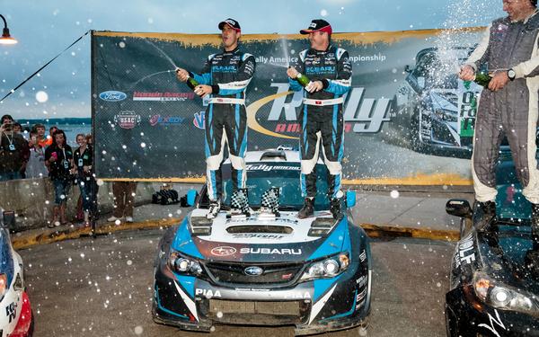 2014 Rally Champions David Higgins and Craig Drew celebrate a ...