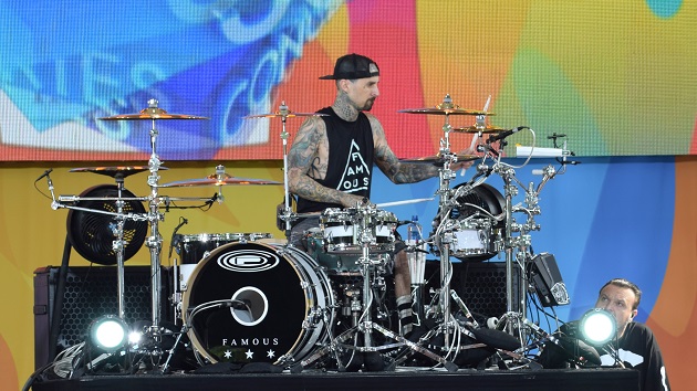 Watch Travis Barker give Blink-182 fan his drum sticks on first show of ...