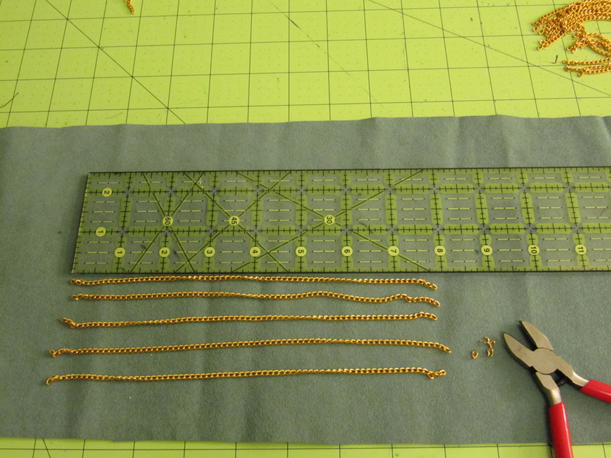 Add Zipper-Pull Tassels to a Portfolio Clutch Bag - Threads