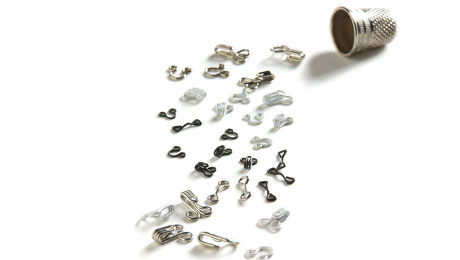 Place and Sew Hooks and Eyes Correctly - Threads