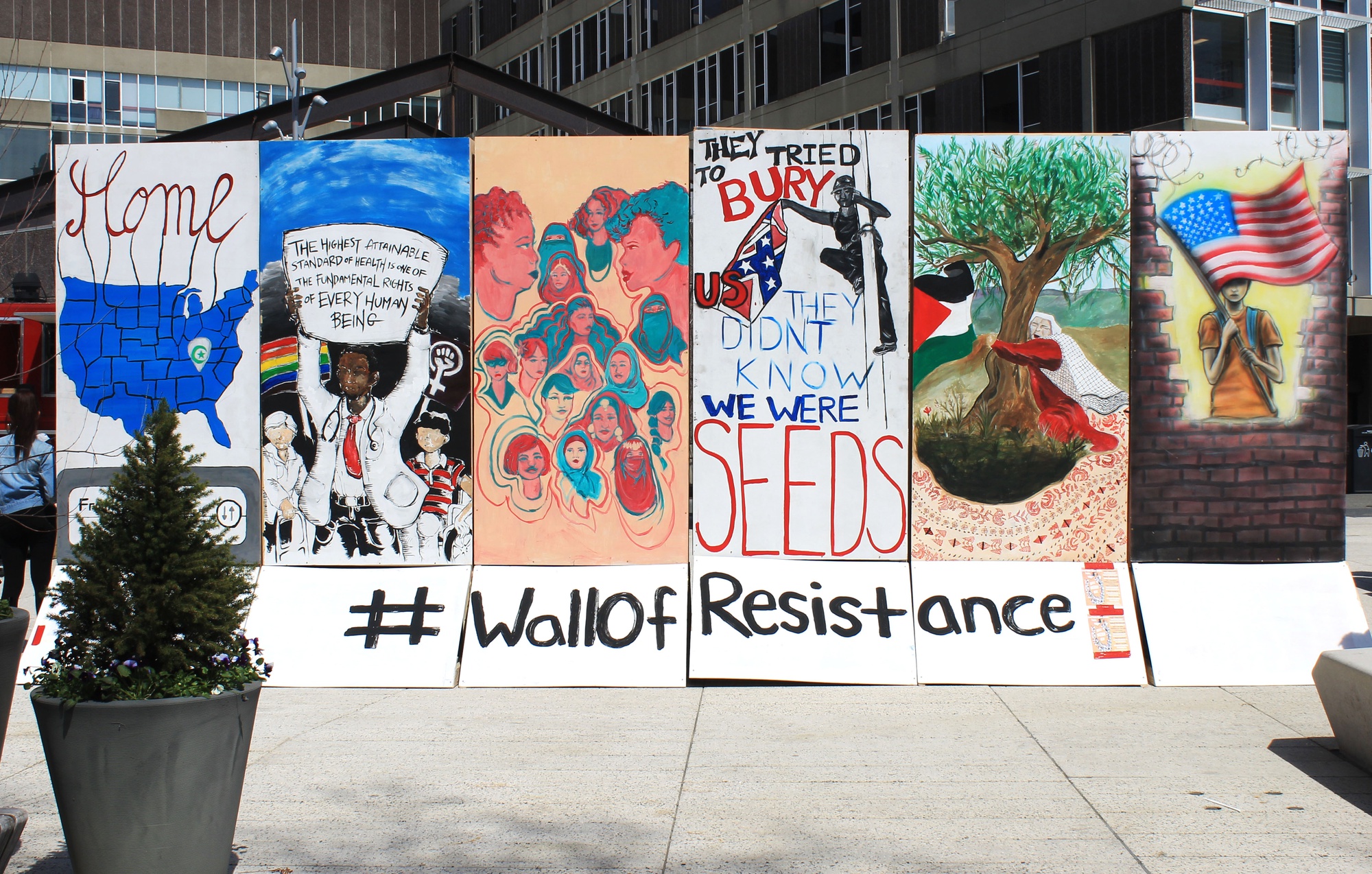 Activists, Artists Build 'Wall of Resistance' in Science Center Plaza ...